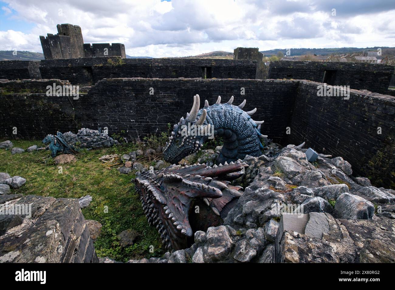 Dragons at Caerphilly Castle in early Spring, Wales Stock Photo - Alamy