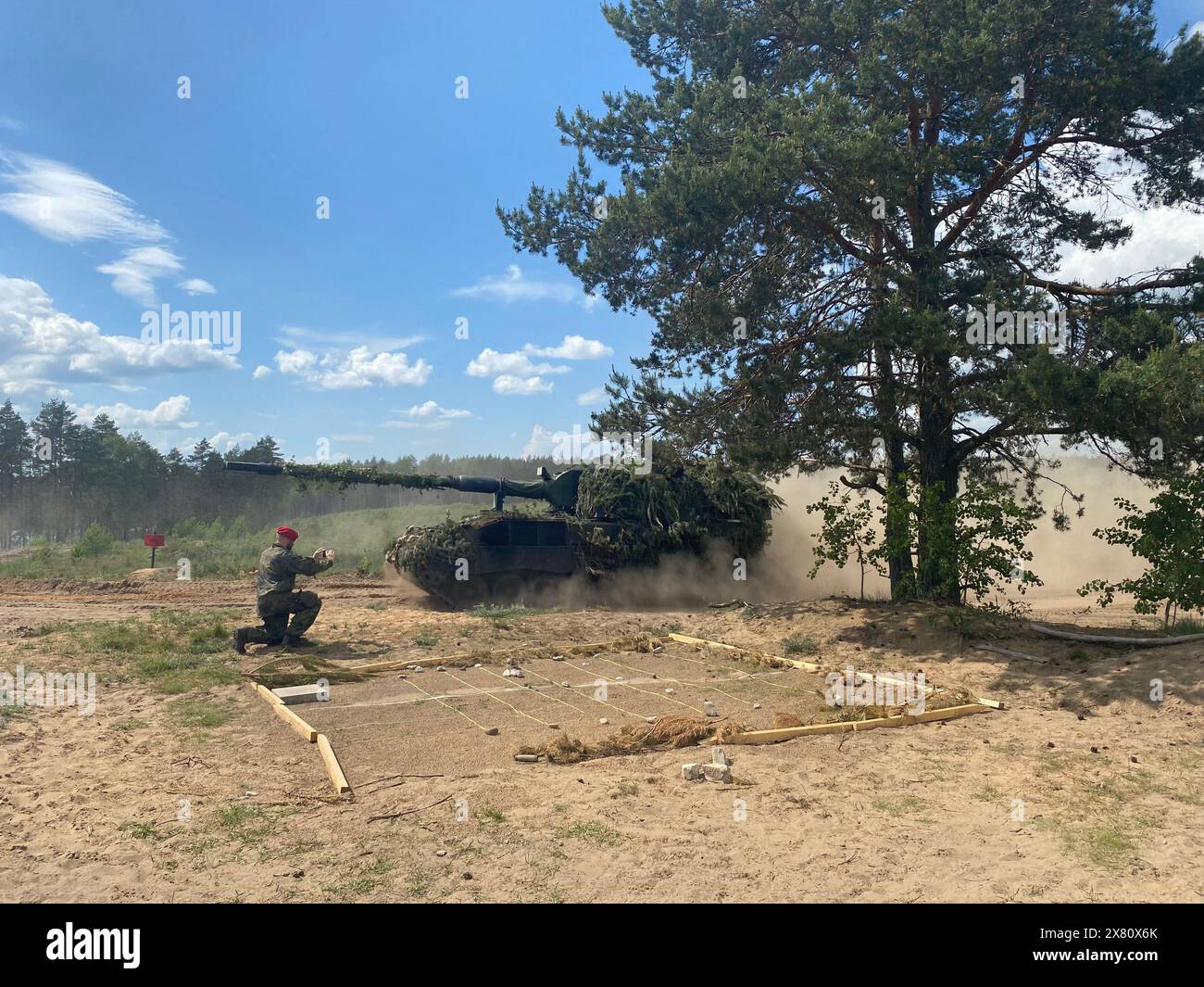 Pabrade, Lithuania. 22nd May, 2024. A German soldier photographs a ...