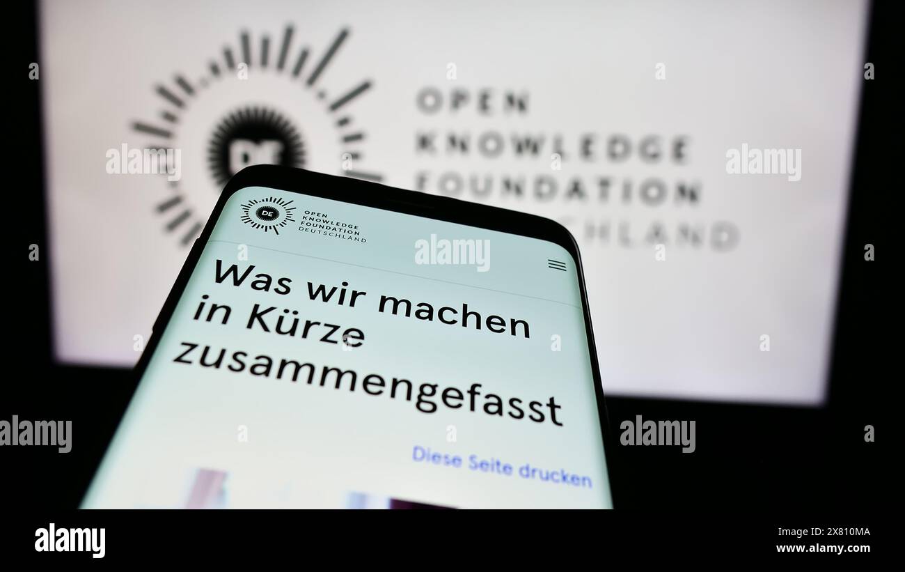 Mobile phone with website of Open Knowledge Foundation Deutschland e.V ...