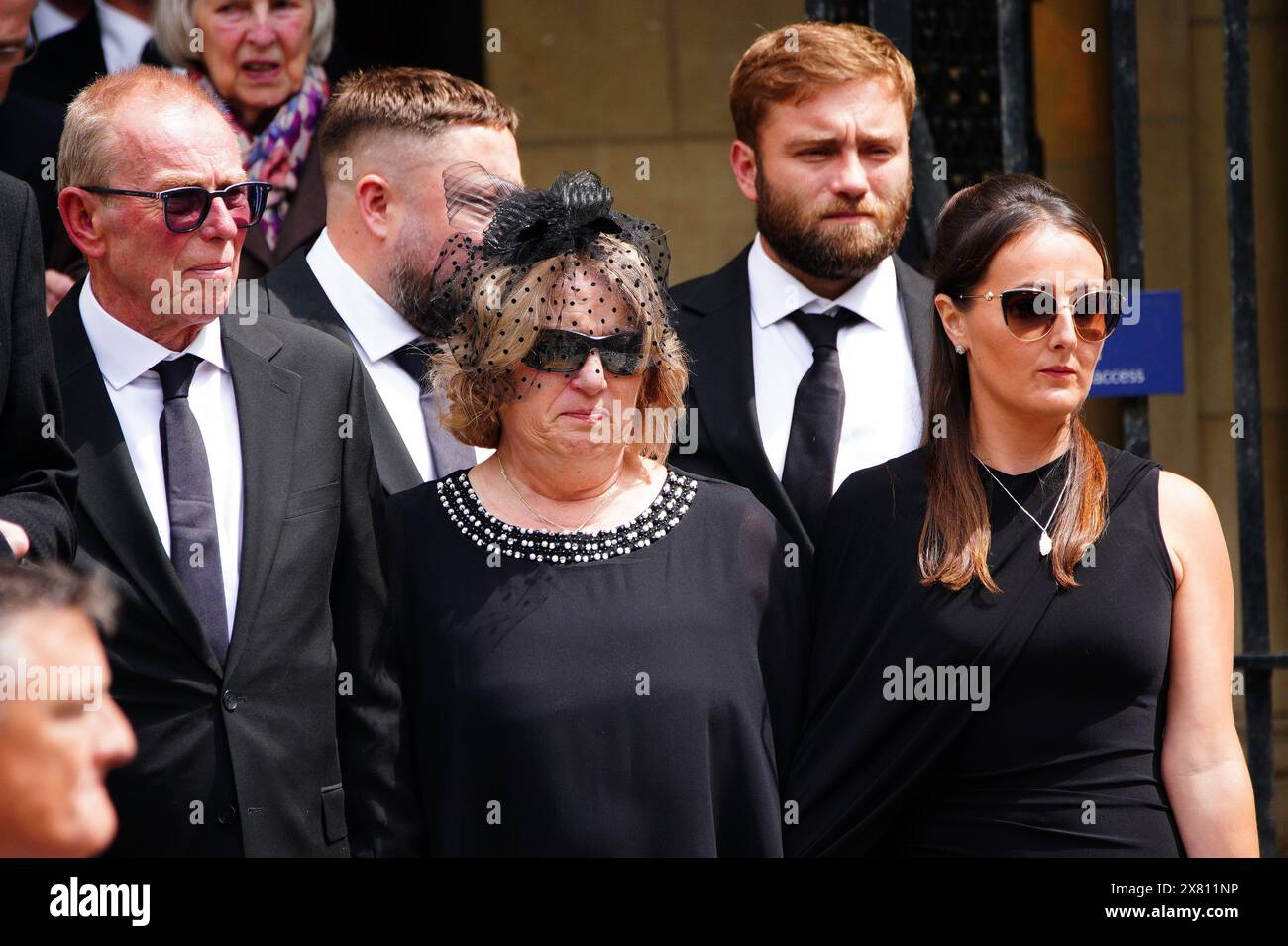 Mourners leave Truro Cathedral after the funeral service of aid worker ...