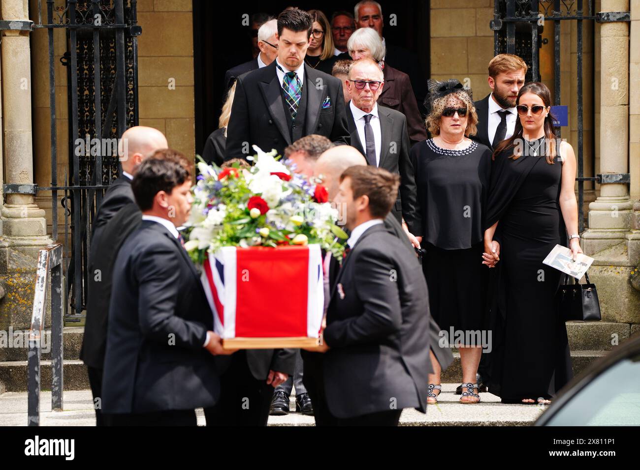 The coffin of aid worker James Henderson, who was among seven World ...