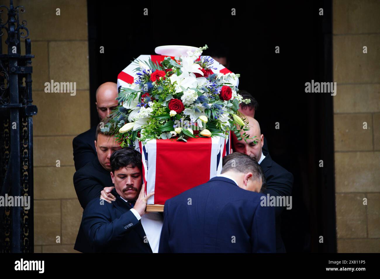 The coffin of aid worker James Henderson, who was among seven World ...