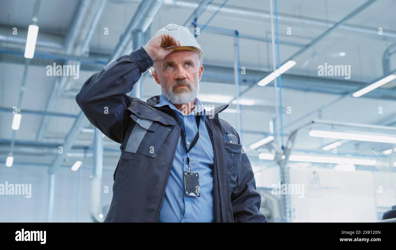 Middle aged engineer putting on hi-res stock photography and images - Alamy