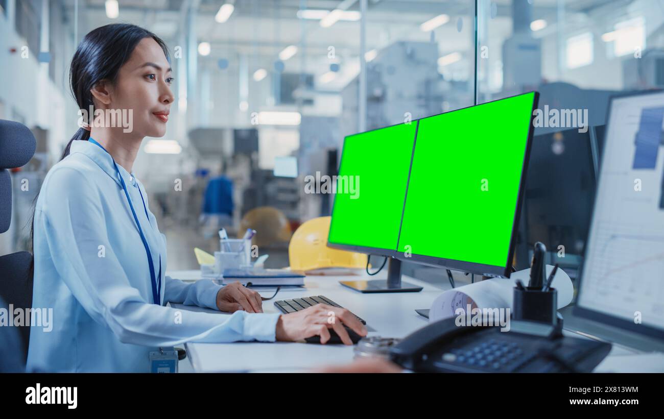 Factory Office Facility: Industrial Engineer Drafting Blueprints of a ...