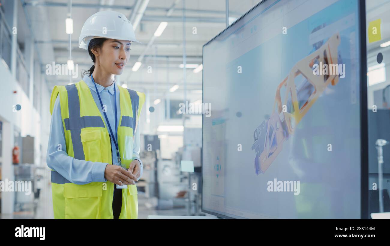 Factory Office Meeting: Chief Engineer Explaining New Workflow for ...