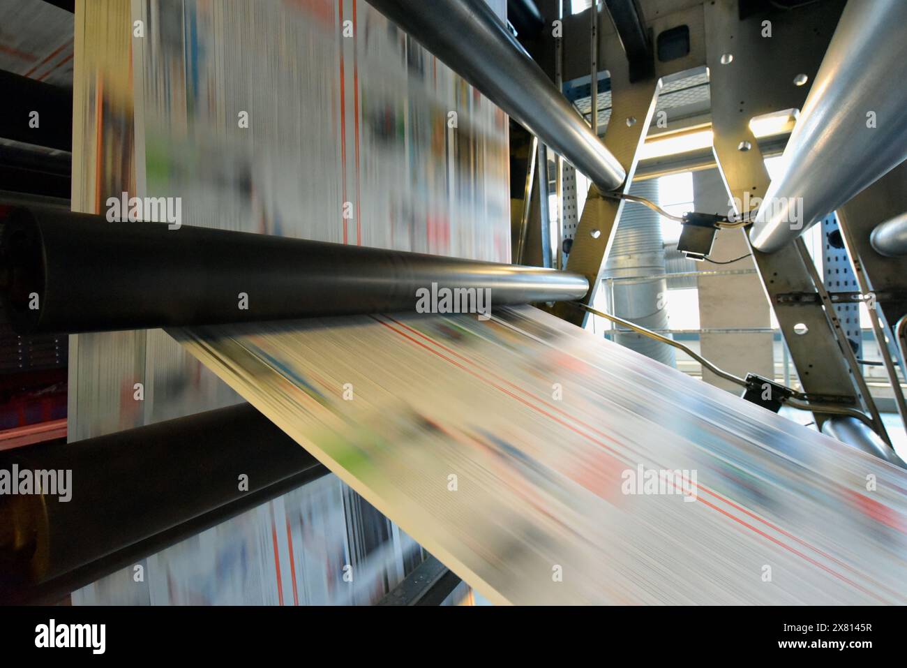 printing of coloured newspapers with an offset printing machine at a ...