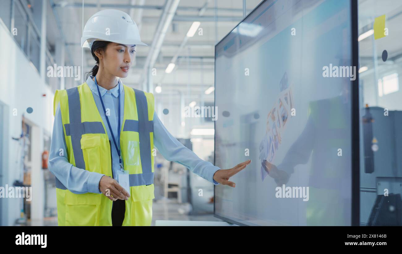 Factory Office Meeting: Portrait of Female Chief Engineer Explaining ...