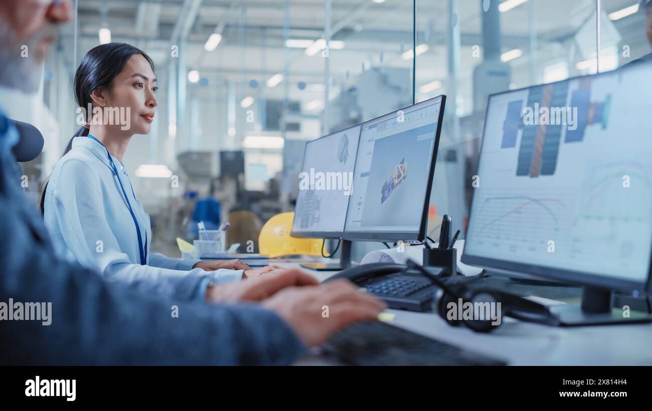 Factory Office Facility: Industrial Engineer Drafting Blueprints of a ...