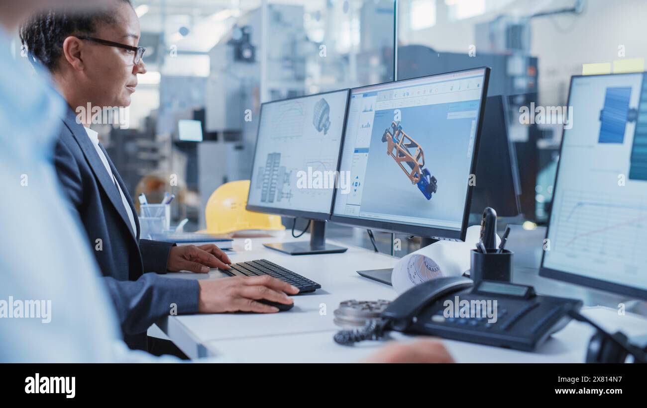 Factory Office Facility: Industrial Engineers Drafting Blueprints of a ...