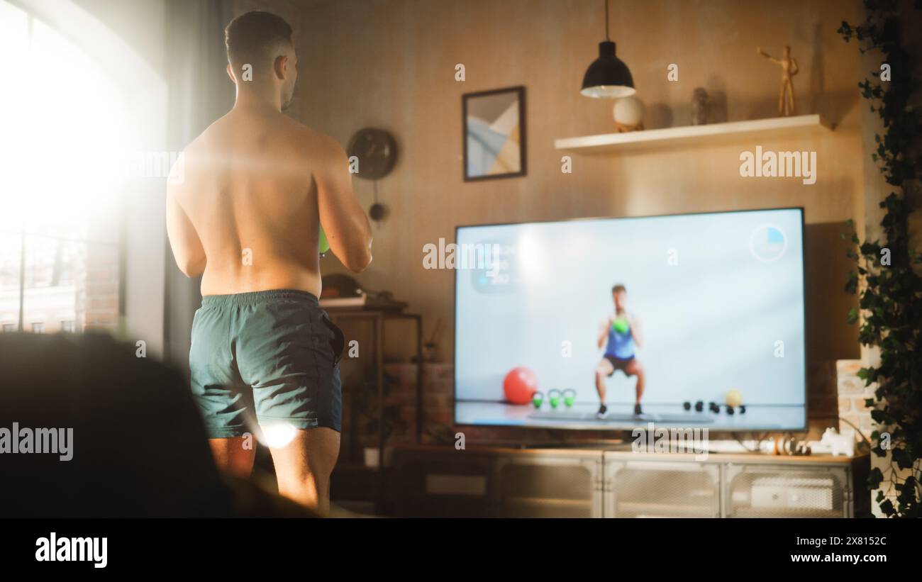 Home Gym Training: Handsome Muscular Black Man Using Kettlebell, Does ...