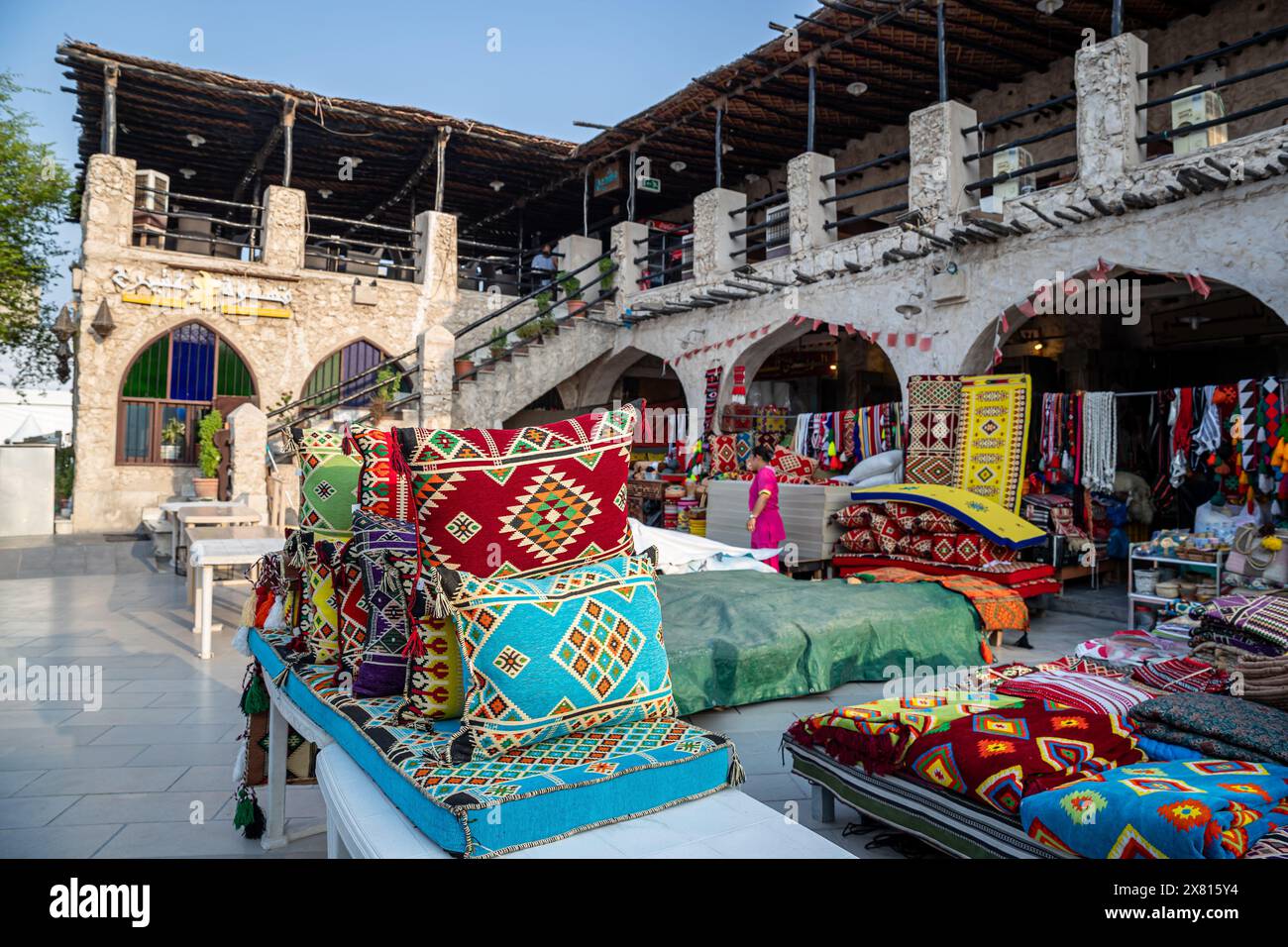 Qatar, Doha, Bright colours of carpets outside the Souq Stock Photo - Alamy
