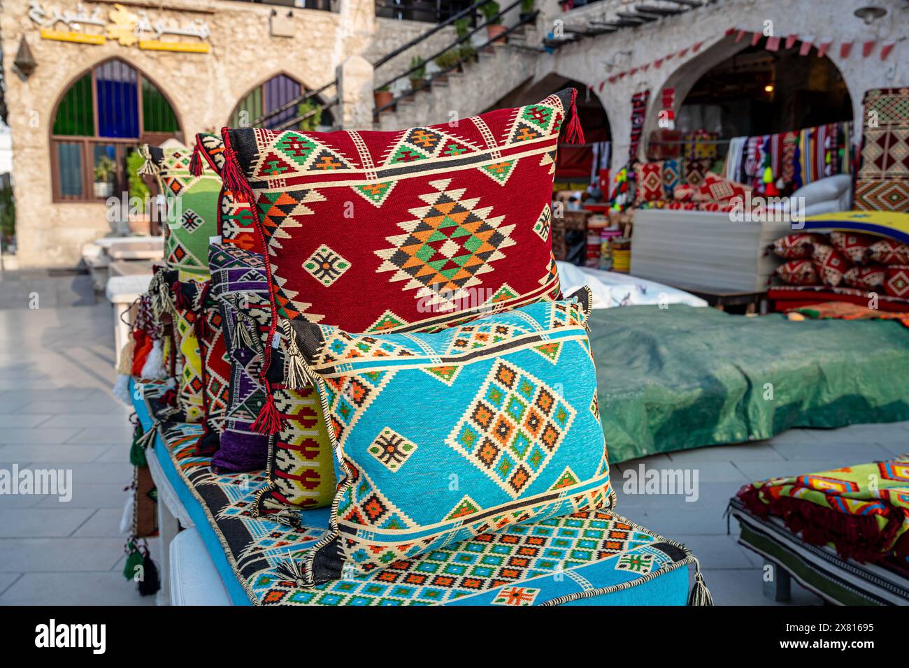 Qatar, Doha, Bright colours of carpets outside the Souq Stock Photo - Alamy