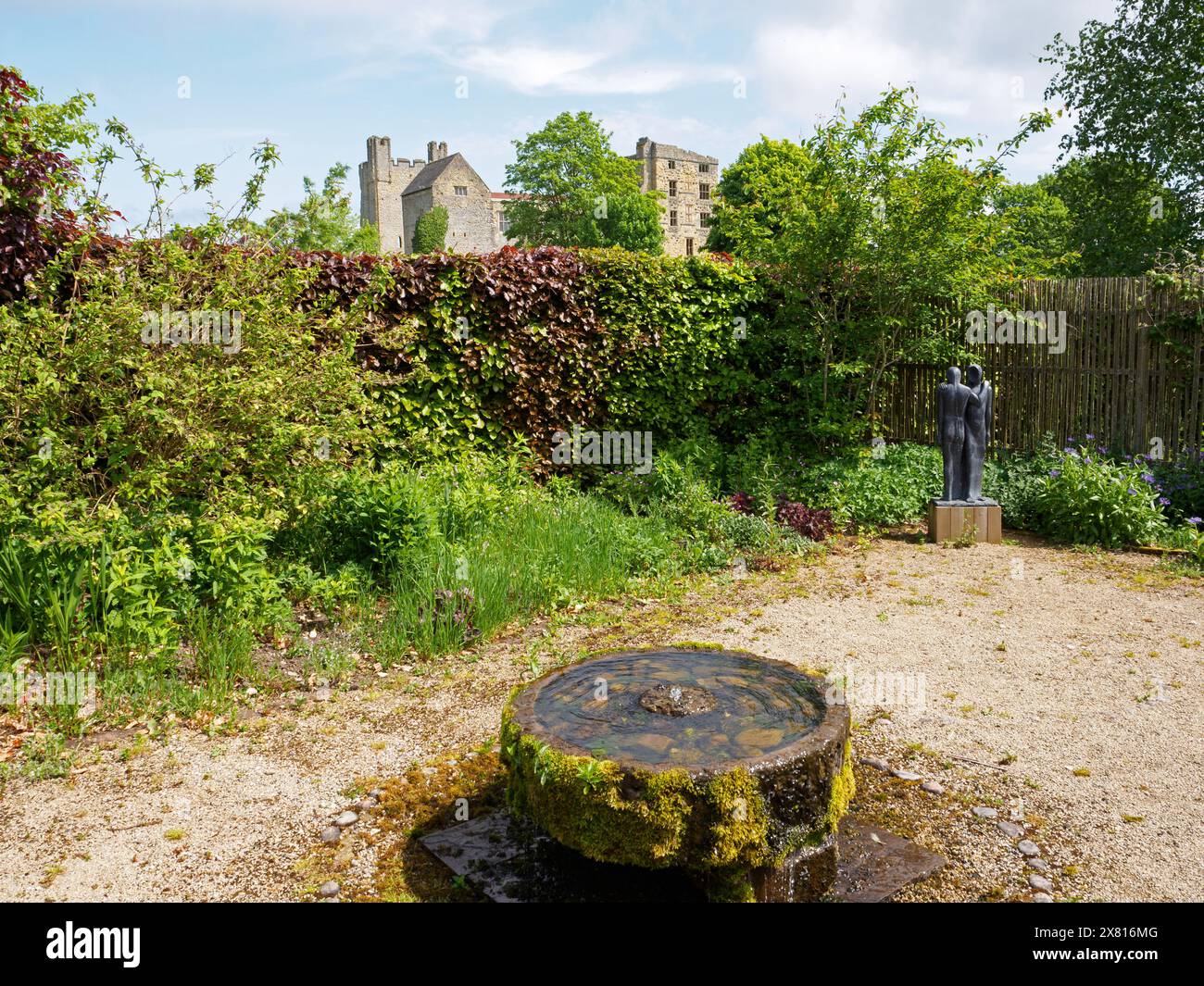Circular water feature at Helmsley Walled Garden, with the castle in ...