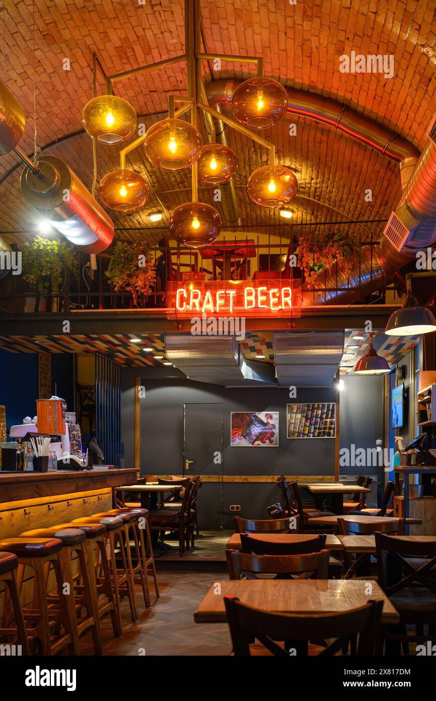 Craft Beer Bar with an illuminated neon Craft Beer sign Stock Photo - Alamy
