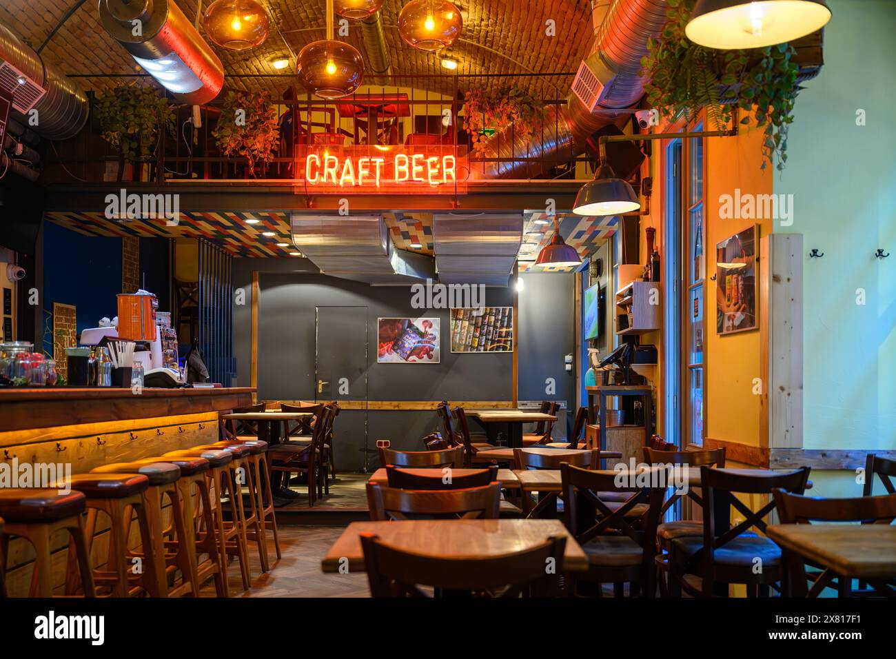 Craft Beer Bar with an illuminated neon Craft Beer sign Stock Photo - Alamy
