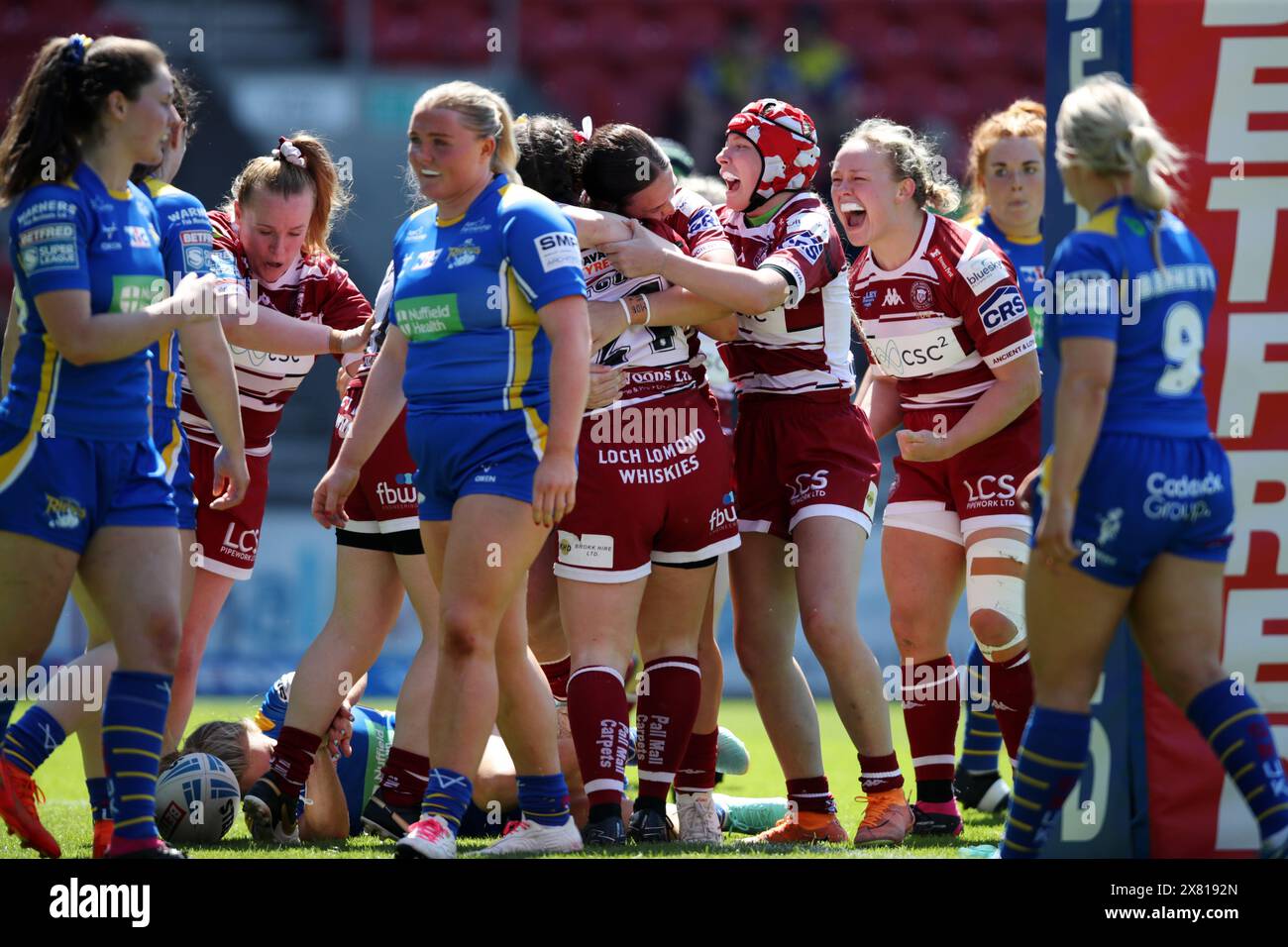 Wigan Warriors' Jade Gregory-Haselden celebrates with teammates after ...
