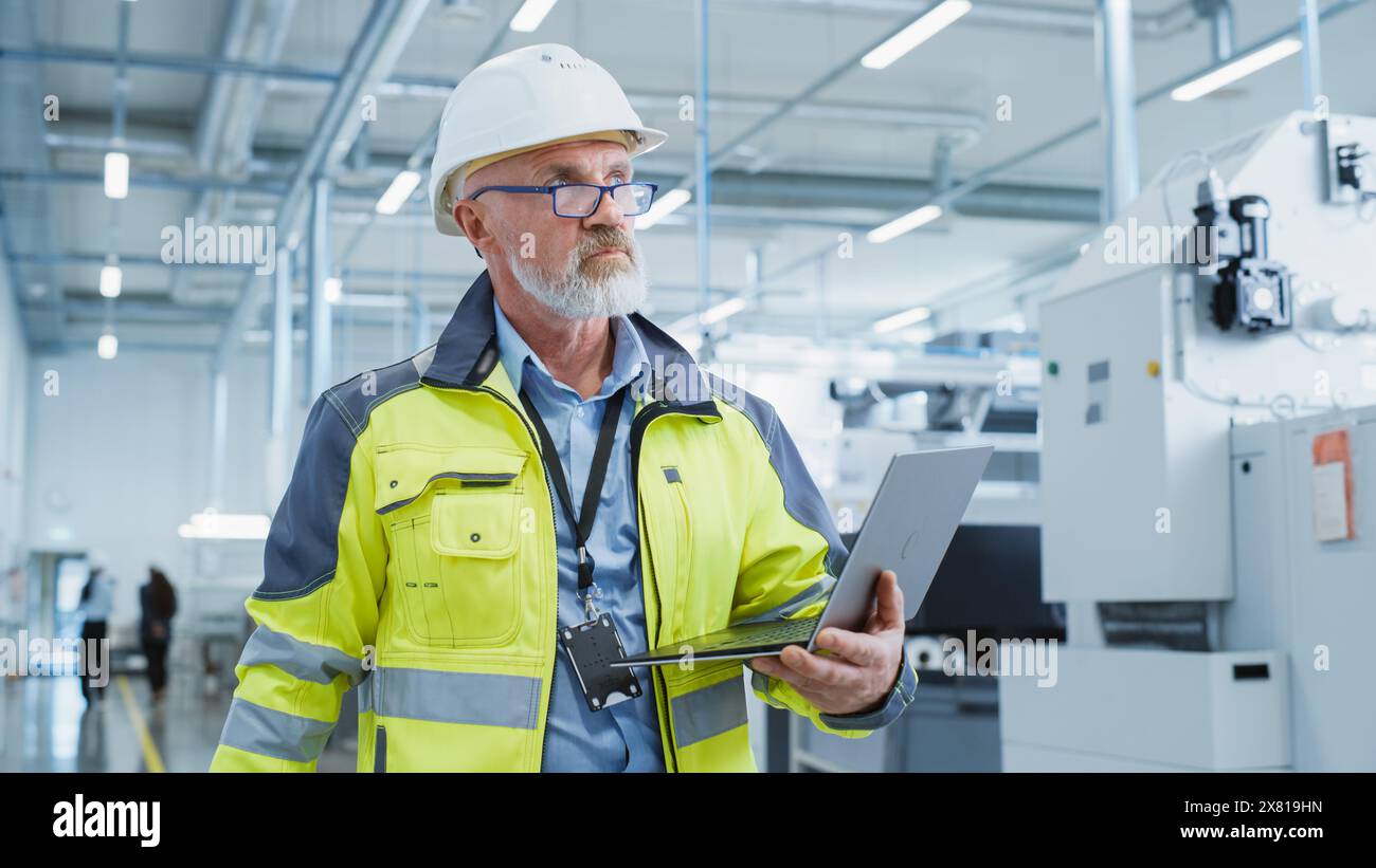 Portrait of a Bearded Middle Aged Engineer Standing in a Factory ...