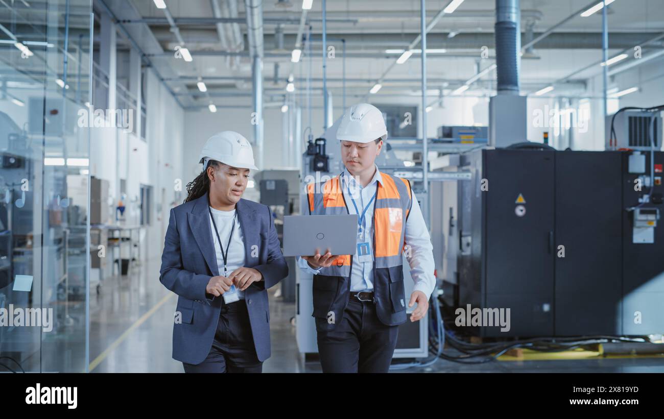 Professional Heavy Industry Employees Wearing Hard Hats at Factory ...