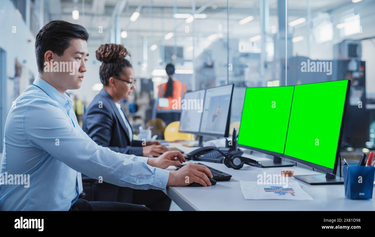 Factory Office Room: Industrial Engineers Developing Models of a Heavy ...