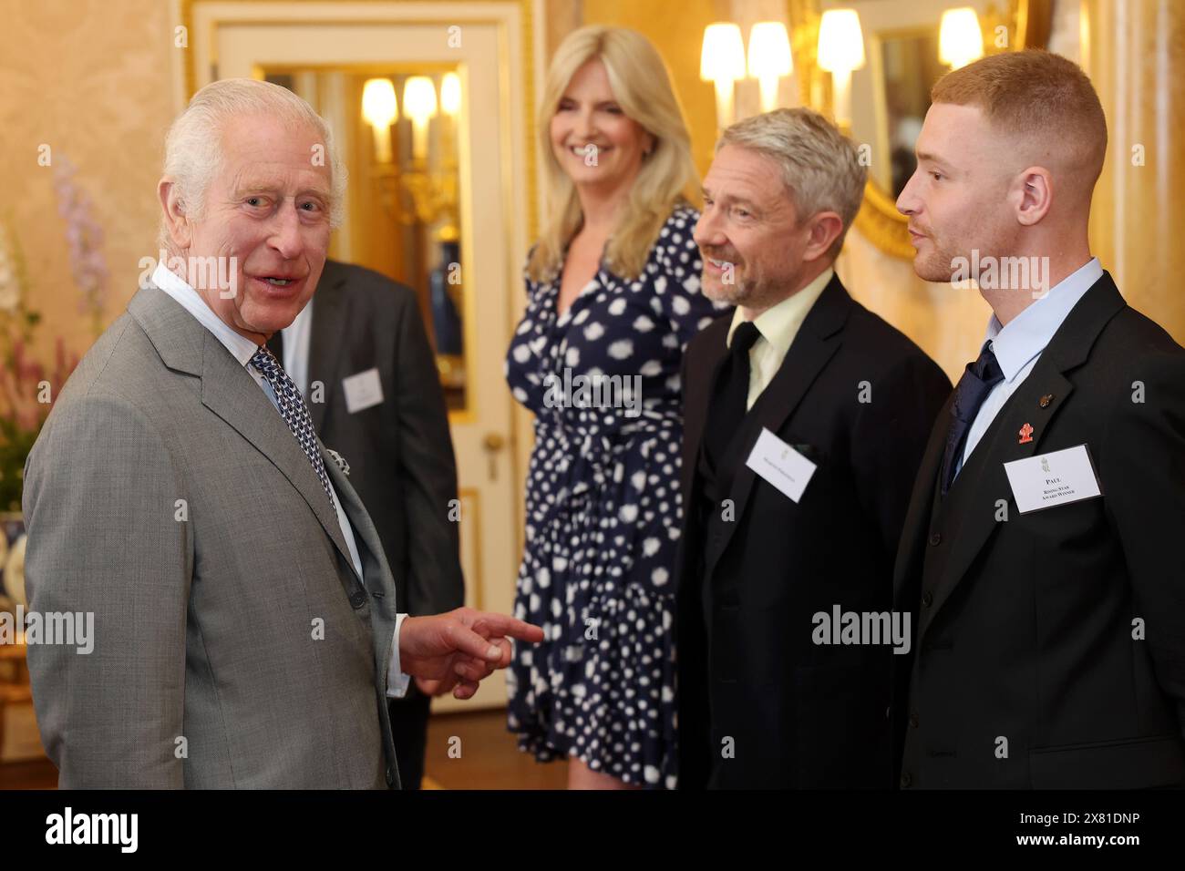 King Charles III (left) meets Martin Freeman (second right) during a ...