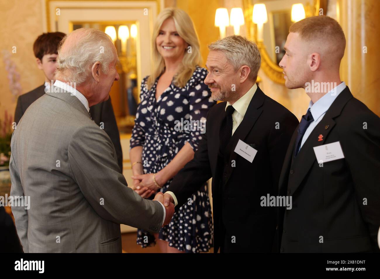 King Charles III (left) meets Martin Freeman (second right) during a ...