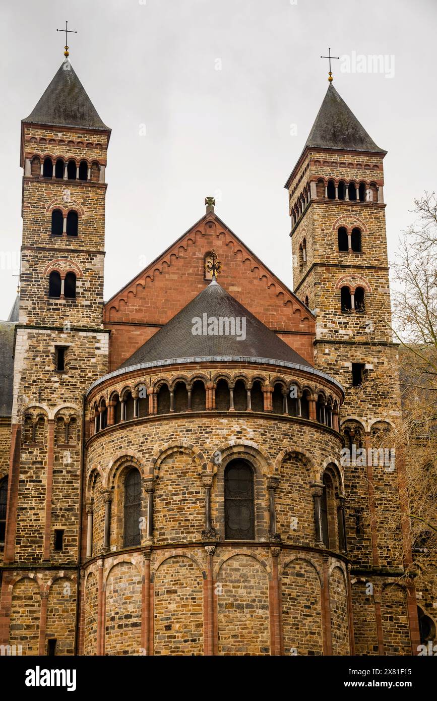Curved brick apse and towers of Romanesque St Servatius Basilica ...