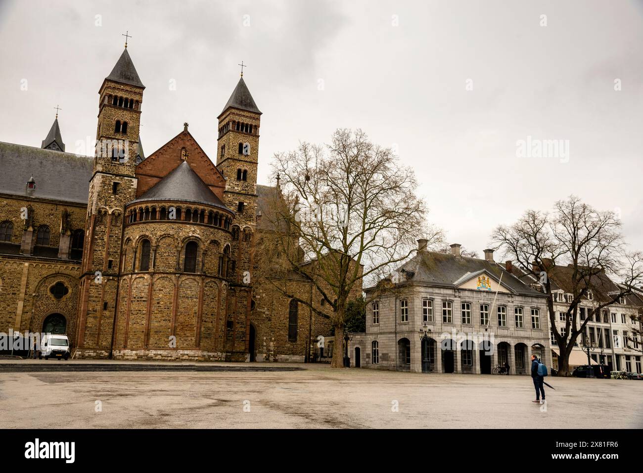 Curved brick apse and towers of Romanesque St Servatius Basilica and ...