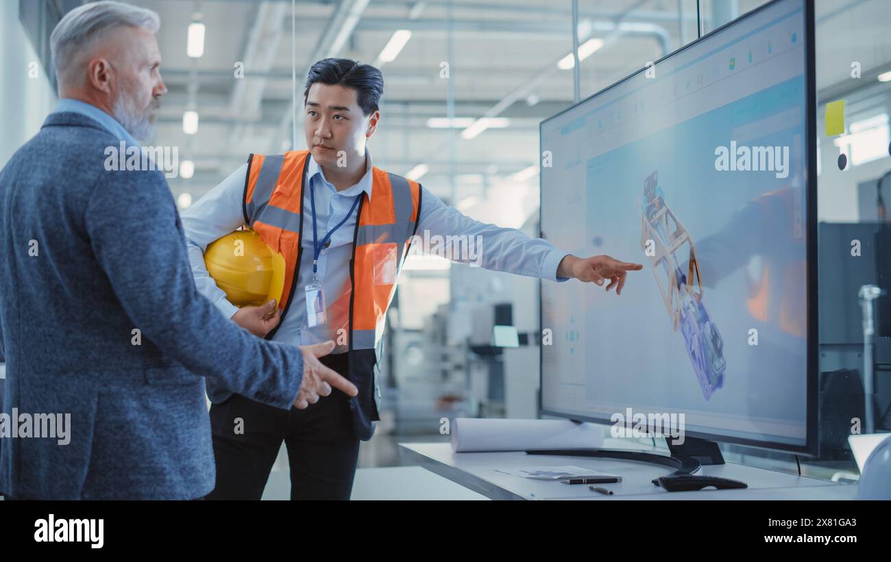 Factory Office Meeting: Senior Manager Talking with Engineer in a ...