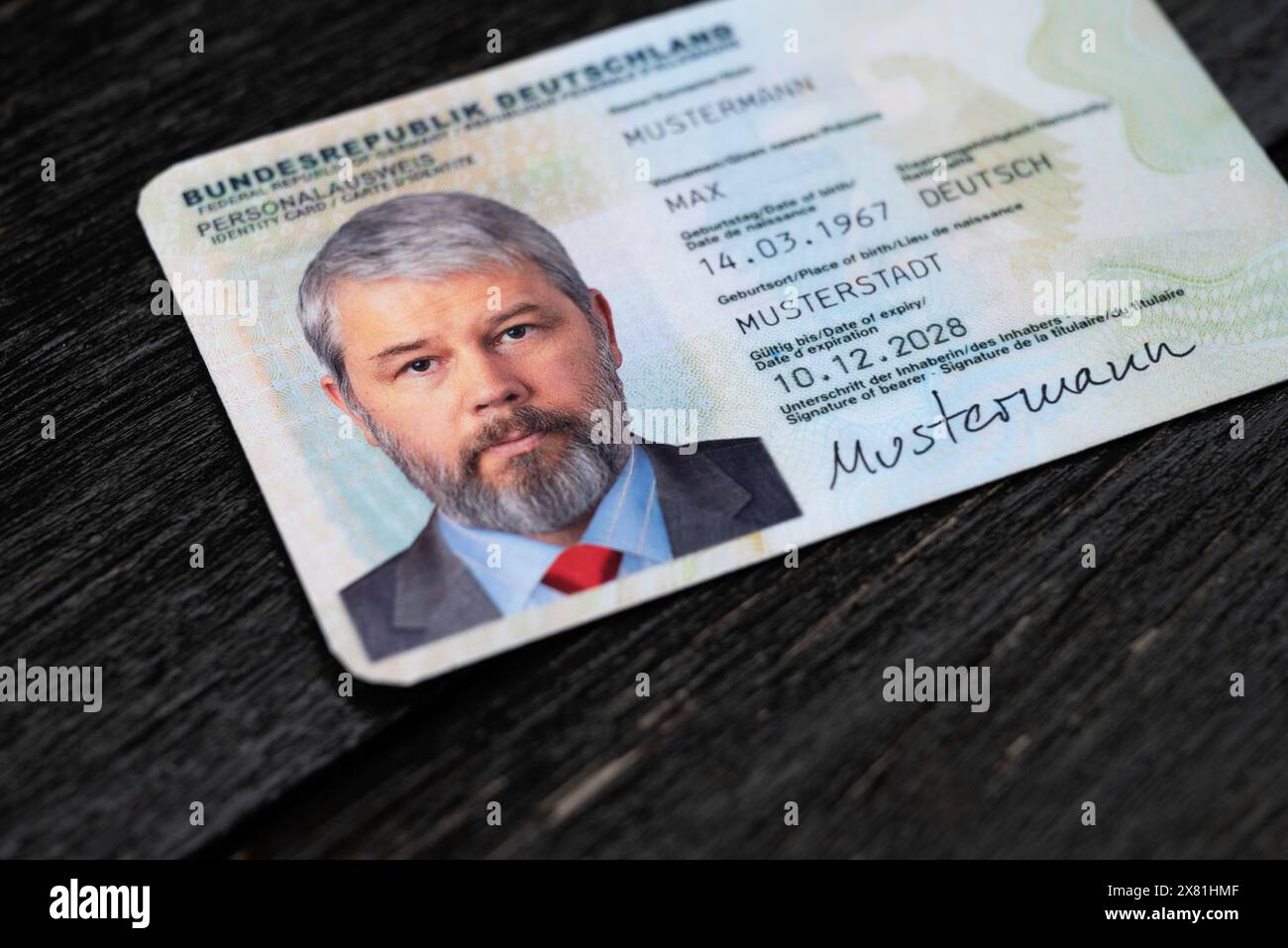 German identity card with businessman around 50 years old Stock Photo ...