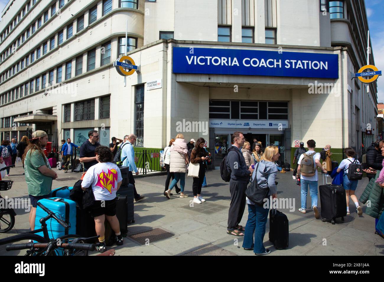 People gather at Victoria Coach Station in London as rail passengers ...