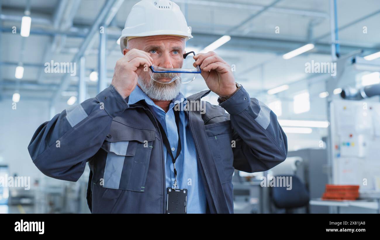 Middle aged engineer putting on hi-res stock photography and images - Alamy