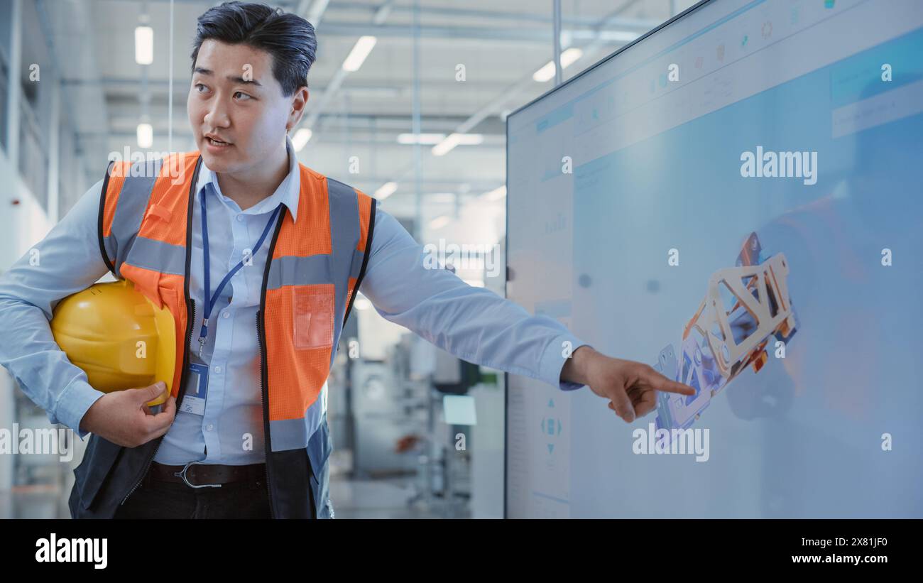 Factory Office Meeting: Chief Engineer Explaining New Workflow for ...