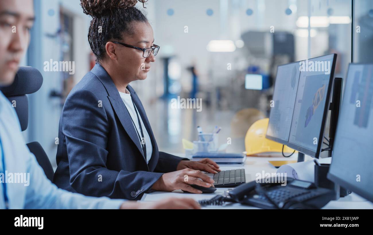 Factory Office Room: Industrial Engineers Developing Models of a Heavy ...