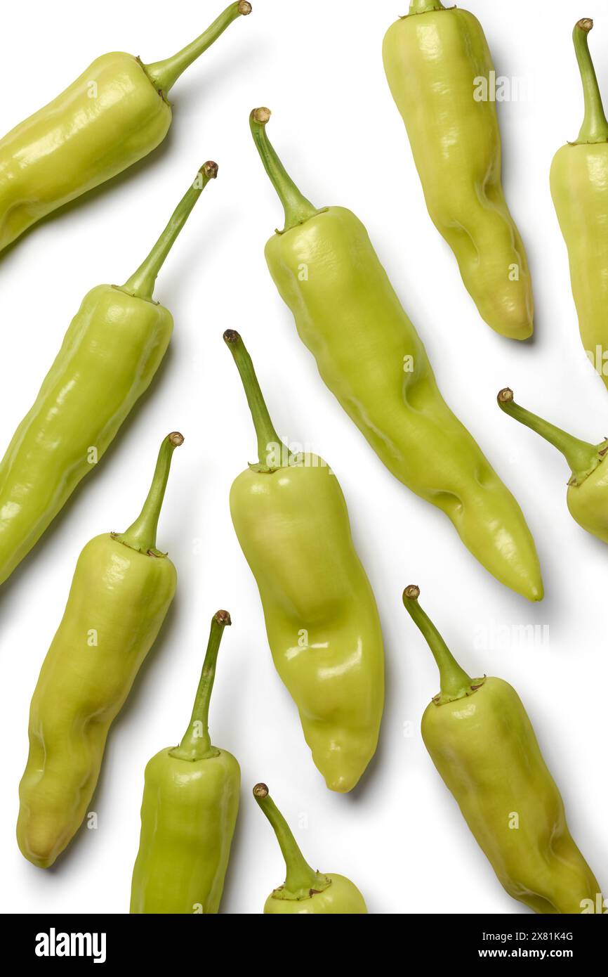 banana peppers arranged isolated on white background, long curved shape ...