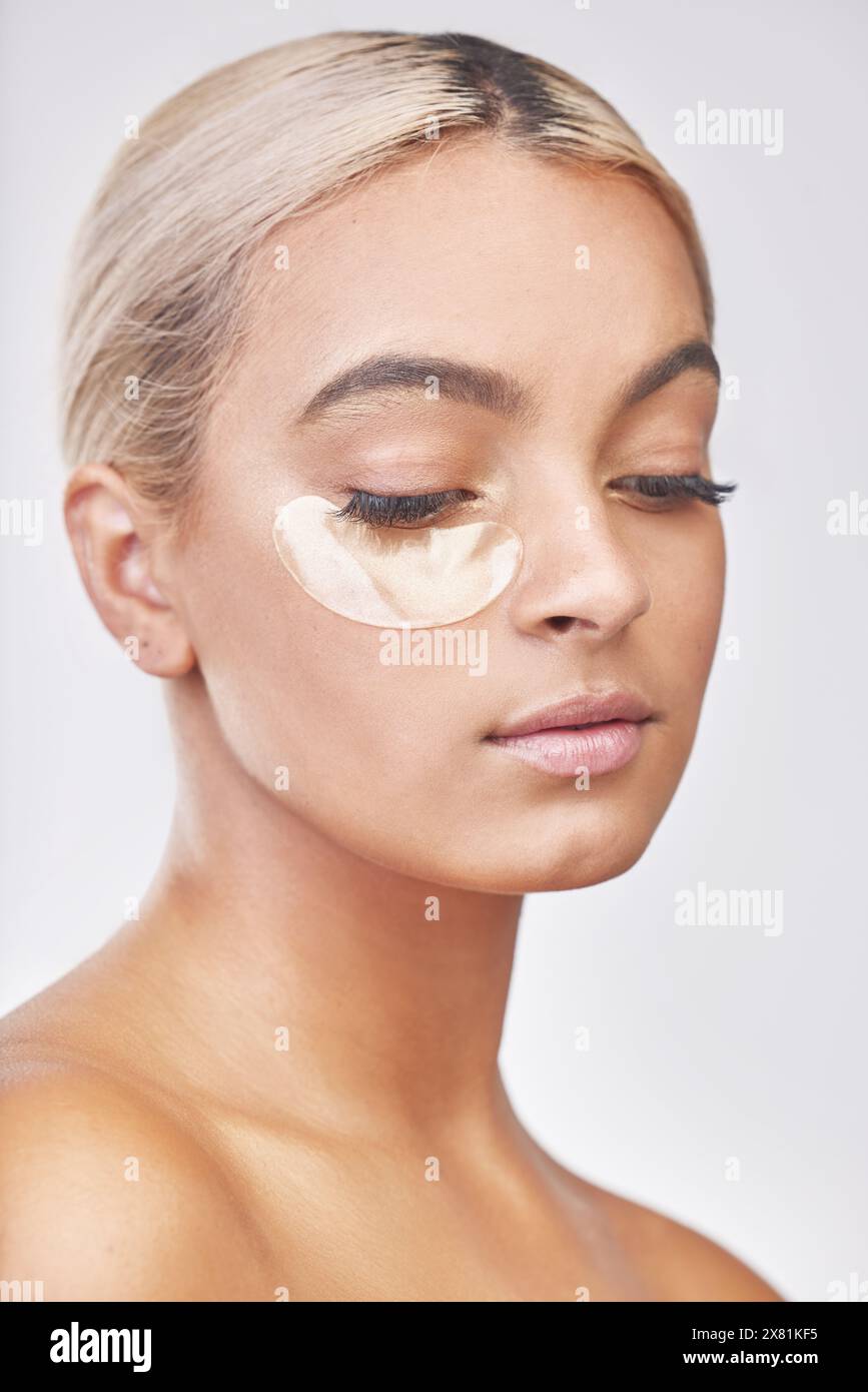 Eye pad, skincare and woman in studio with collagen, natural and beauty ...