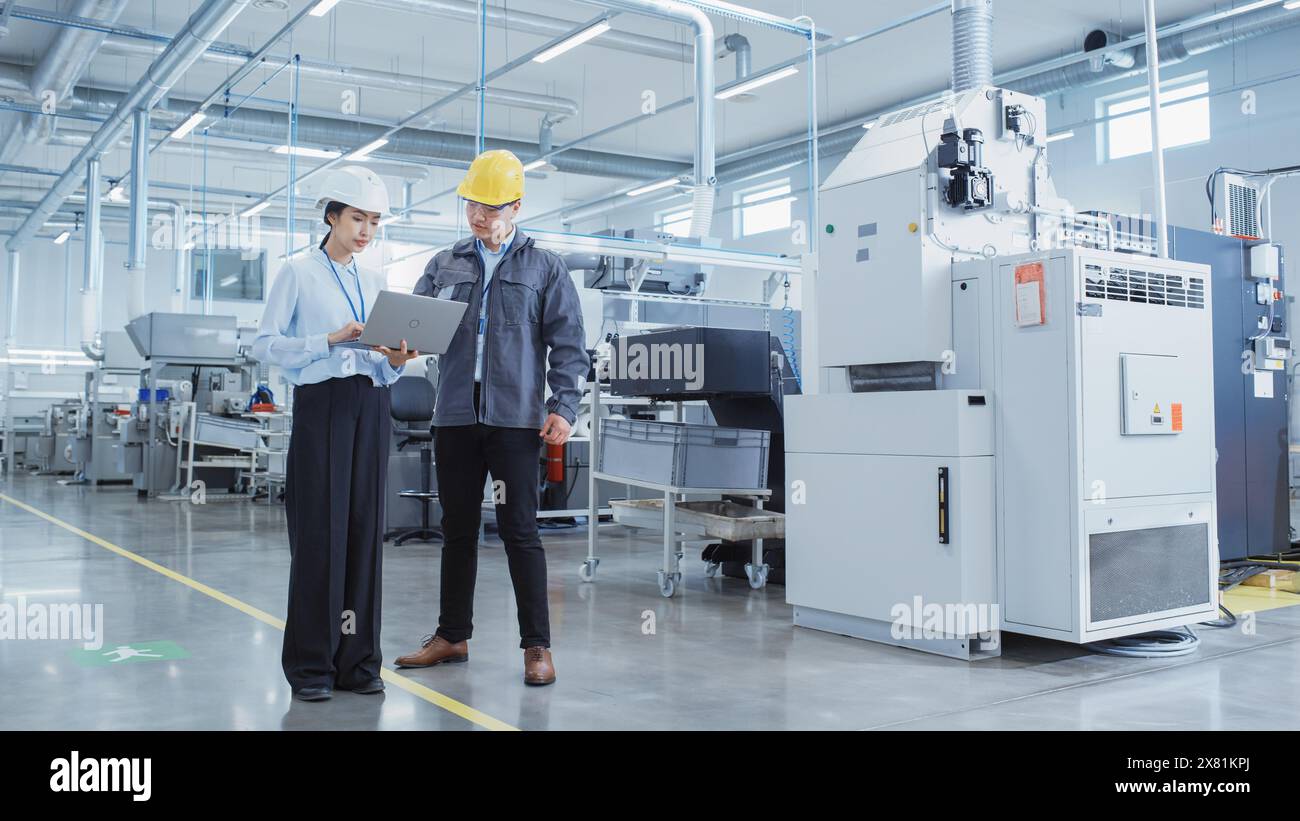 Diverse employees wearing industrial hi-res stock photography and ...