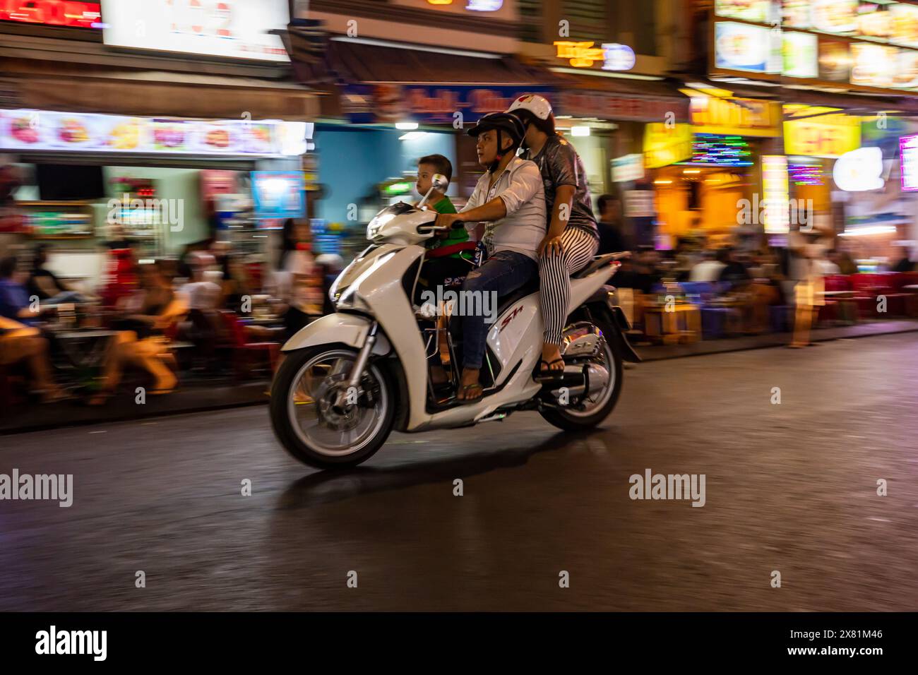 The traffic and motorcycle ride in the city of Saigon in Vietnam Stock ...