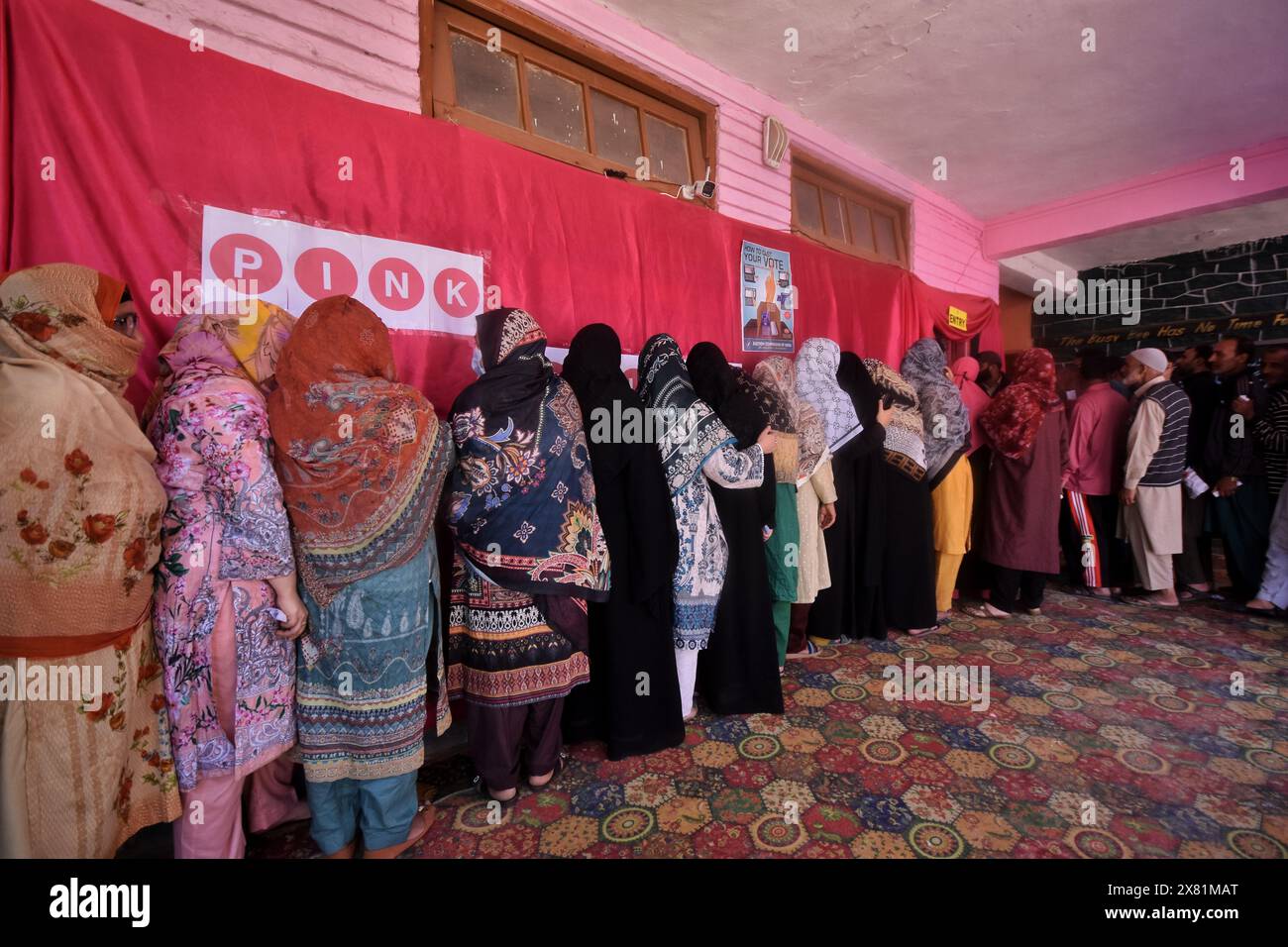 Baramulla, India. 20th May, 2024. Local Voters queue up to cast their ...
