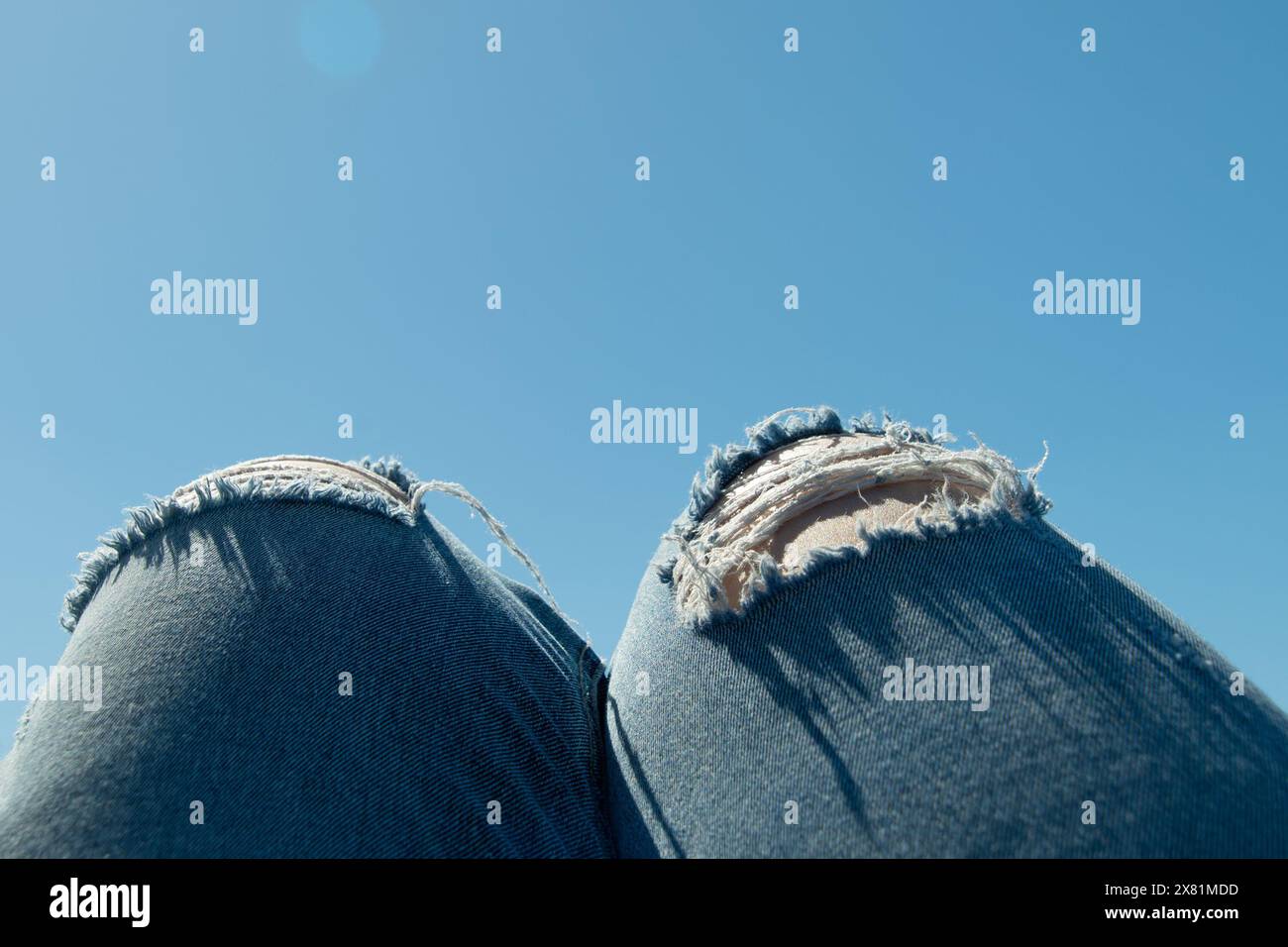 Closeup girl legs in ripped hi-res stock photography and images - Alamy