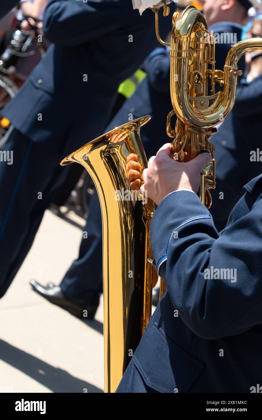 A man plays the saxophone, close-up. Performance by a musical orchestra ...