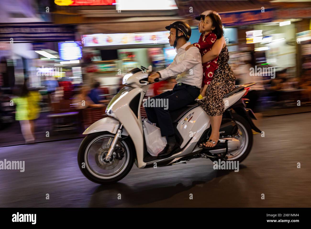 The traffic and motorcycle ride in the city of Saigon in Vietnam Stock ...
