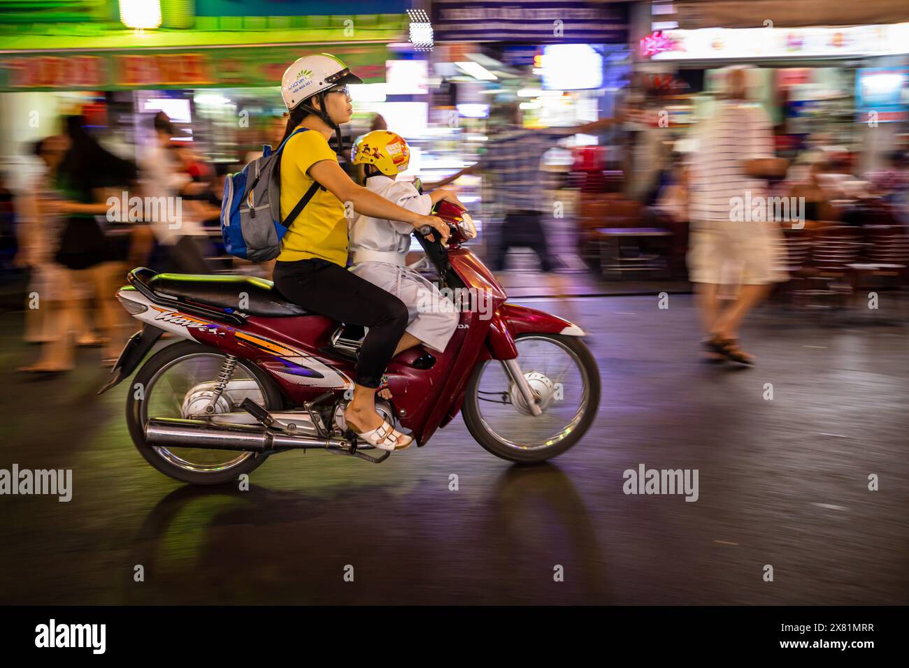 The traffic and motorcycle ride in the city of Saigon in Vietnam Stock ...
