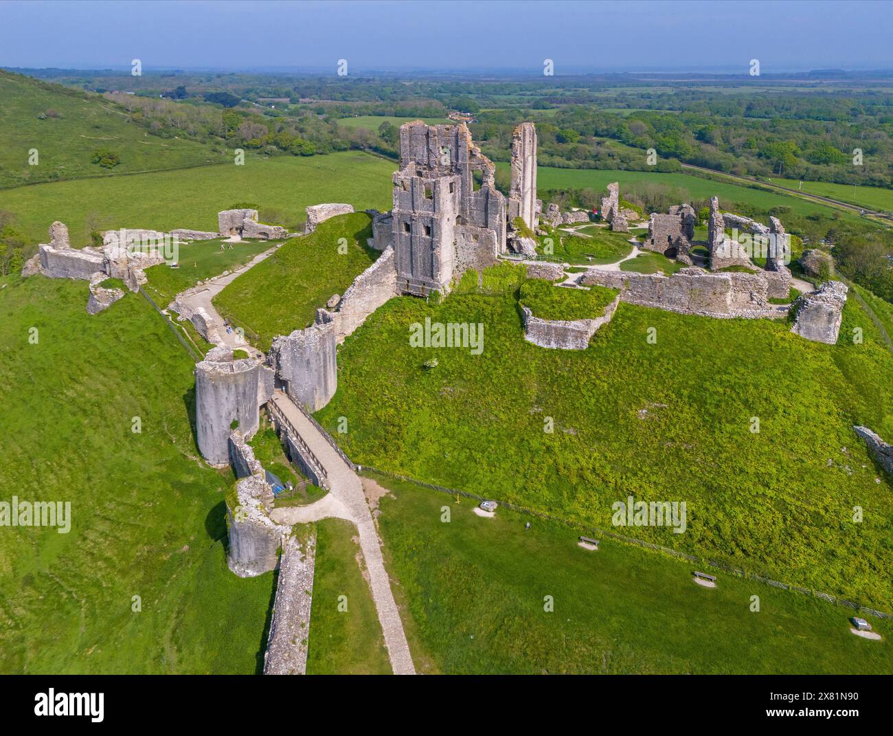 Corfe Castle, Dorset. United Kingdom. A fine Spring Aerial Image of the ...