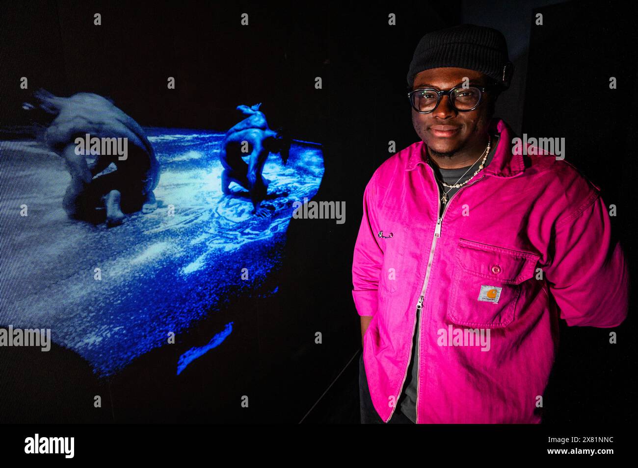 London, UK. 22nd May, 2024. Julian KNXX with his work, Untitled, (oli ...