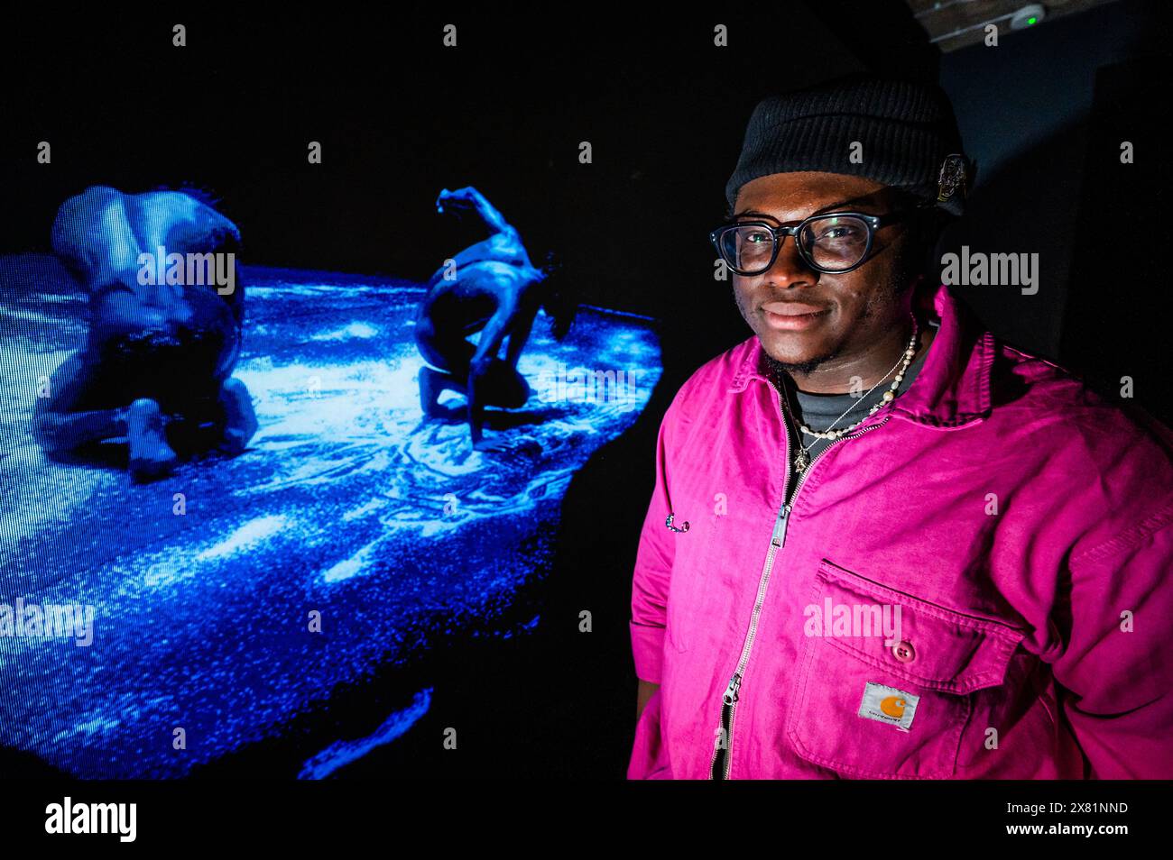 London, UK. 22nd May, 2024. Julian KNXX with his work, Untitled, (oli ...
