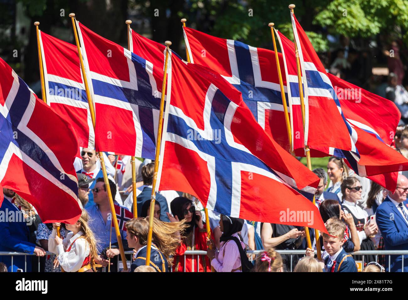 Oslo, Norway. 17th, May 2024. People parade with the flag of Norway ...