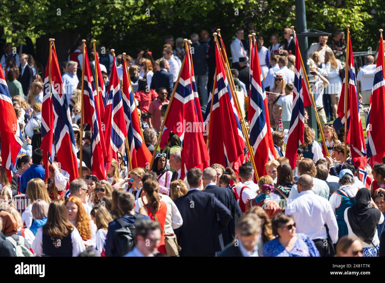 Oslo, Norway. 17th, May 2024. People parade with the flag of Norway ...