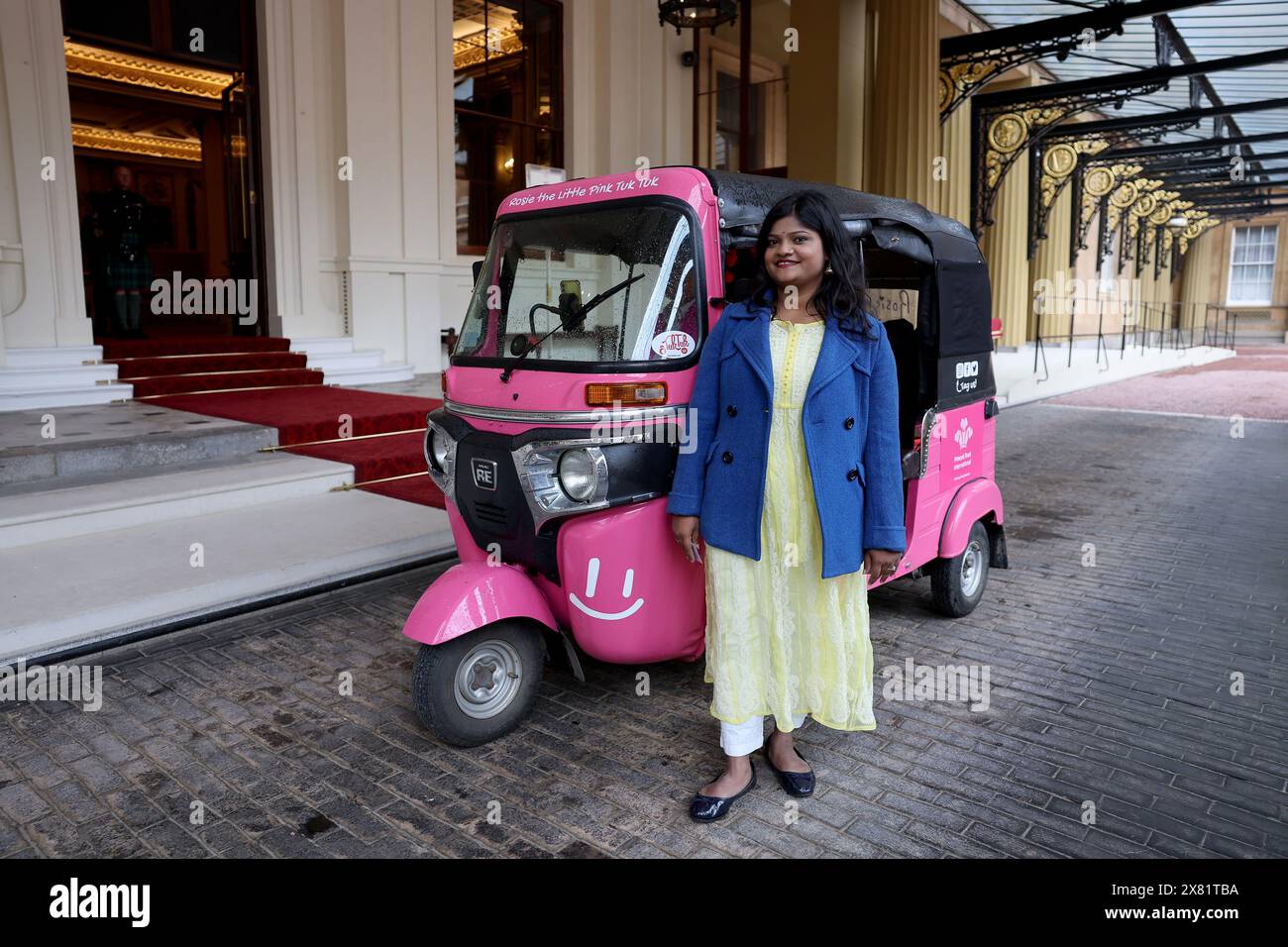 Arti, the Amal Clooney Women's Empowerment Award winner with her pink rickshaw following a ...