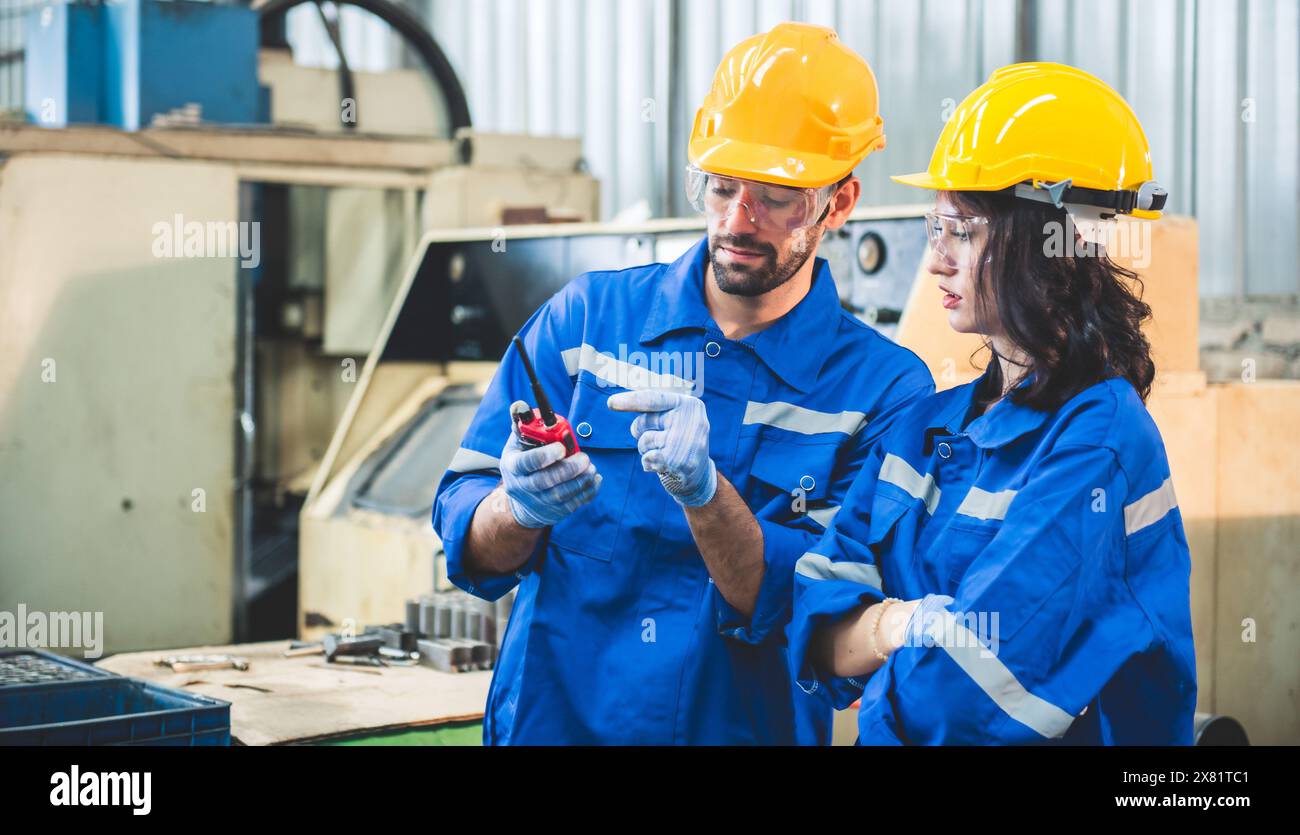 Engineers team mechanic using computer controller Robotic arm for ...