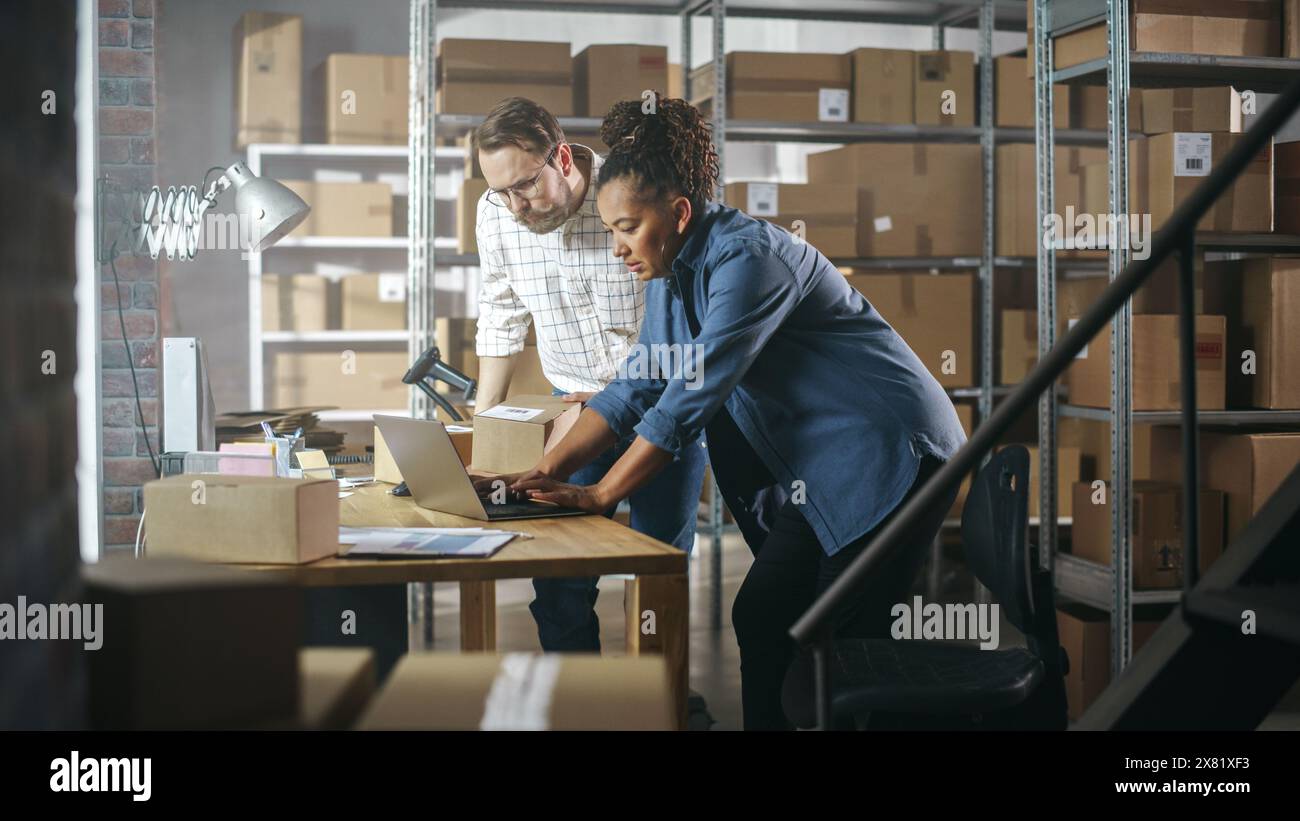 Team employees using laptop inventory hi-res stock photography and ...